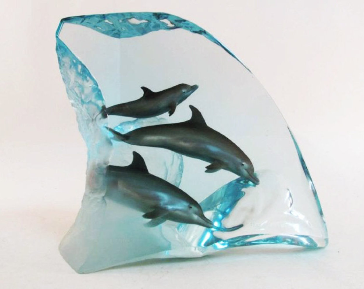 robert wyland acrylic sculpture of dolphins, tribes by Robert Wyland